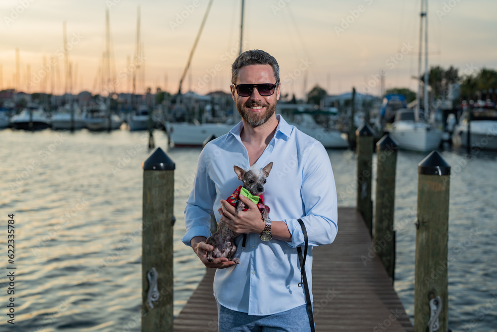 Rich summer business man near the yacht. Portrait of fashion male model ...