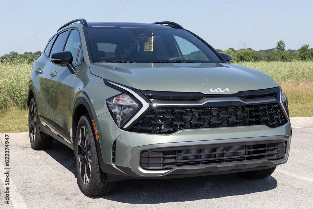 Kia Sportage display at a dealership. Kia offers the Sportage in LX, EX, X-Line, SX, Prestige ...