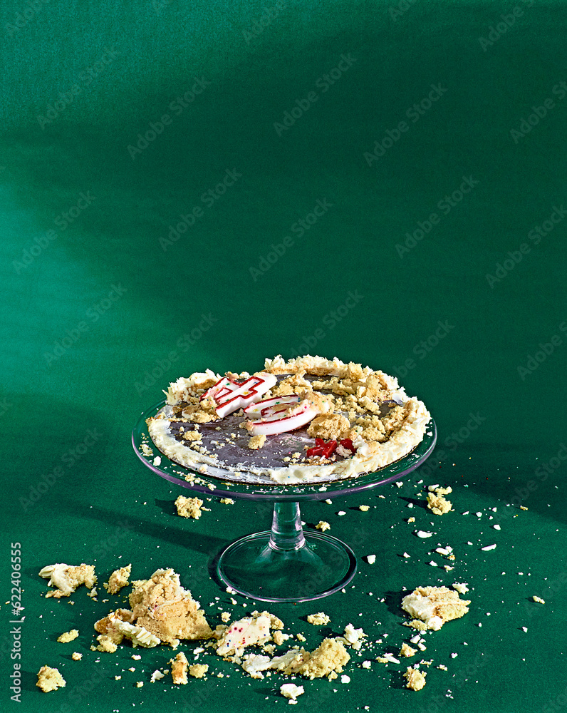 cake destroyed table green background celebration cake stand Stock ...