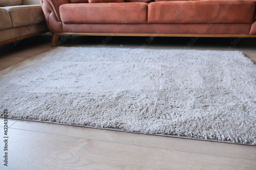 Seamless grey carpet texture background on wooden floor with copy space ...