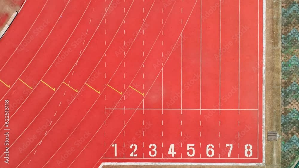 Race track or athletics track start line with lane numbers in stadium ...