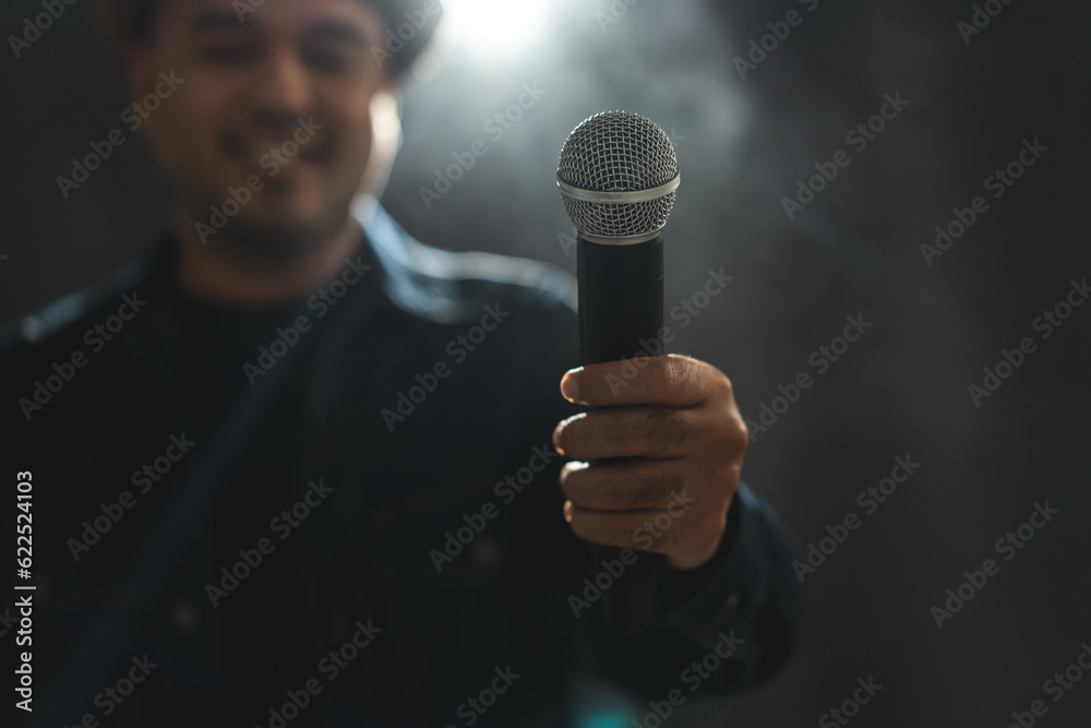 Close up shots of Attractive singer man singing music and playing ...