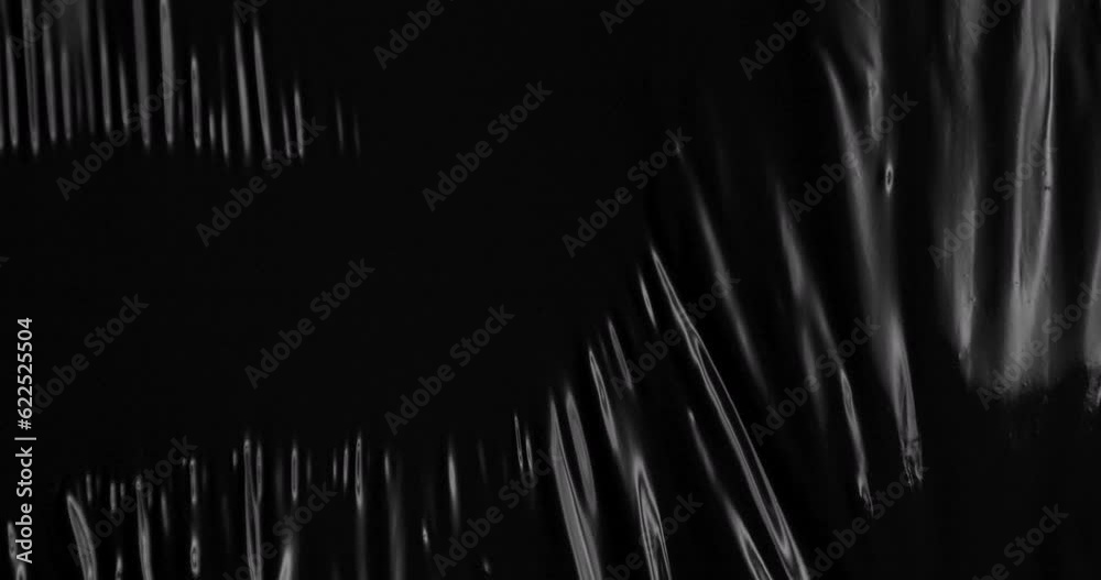 Explore the fascinating depths of a plastic abstract background where ...