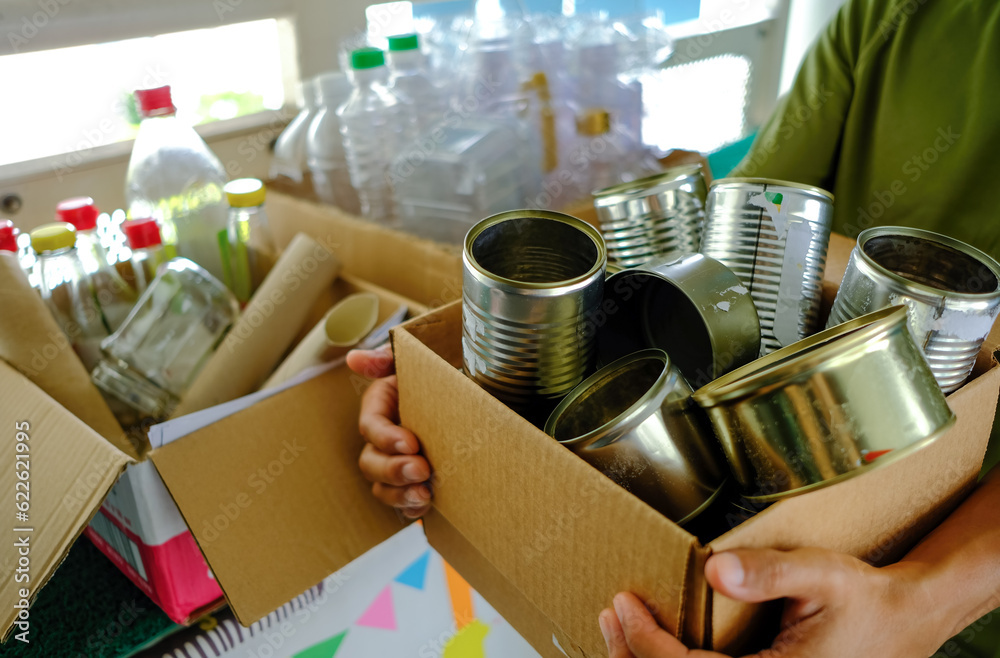Zero waste sustainability concept. Man holding brown carton box of ...