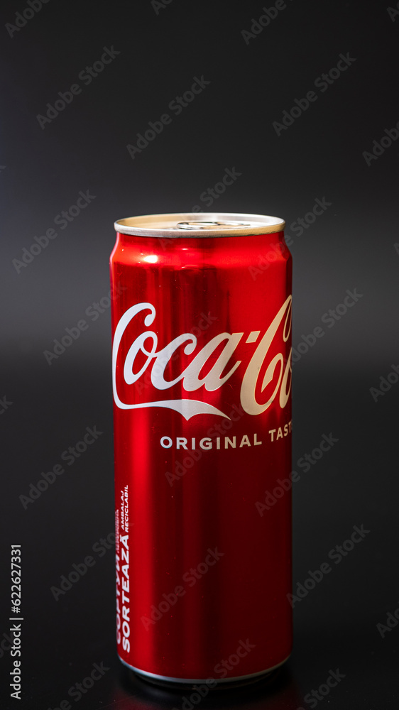 Lvov. Ukraine. 18/06/2023. Can of coca cola on a black background with ...
