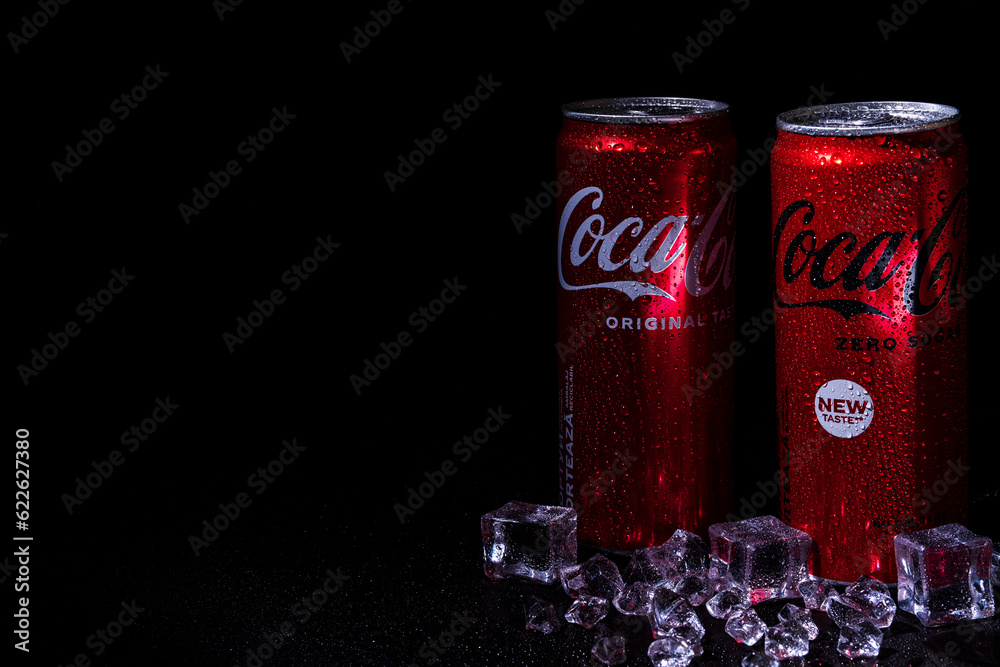 Lvov. Ukraine. 18/06/2023. Can of coca cola on a black background with ...