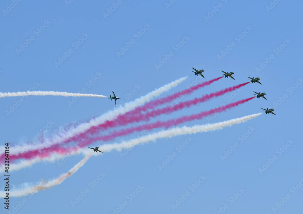 green saudi Hawks falcons aerobatic team fighter jet with blue skies in ...