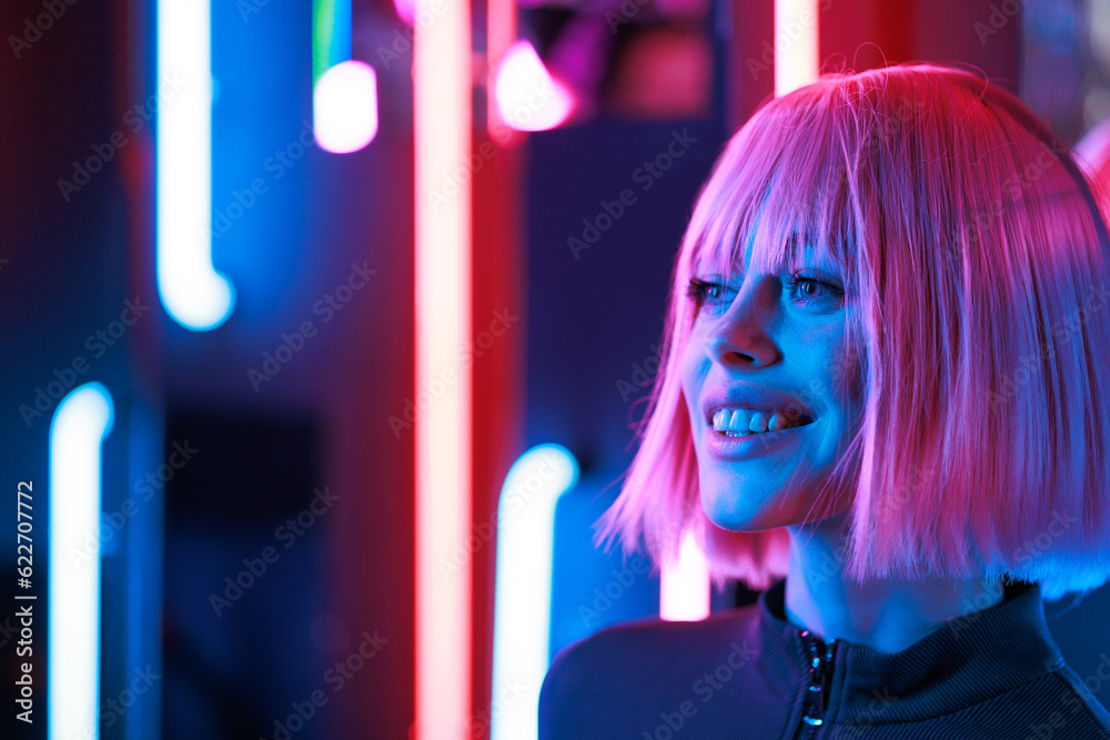 Beautiful Woman With Purple Hair In Futuristic Costume Over White
