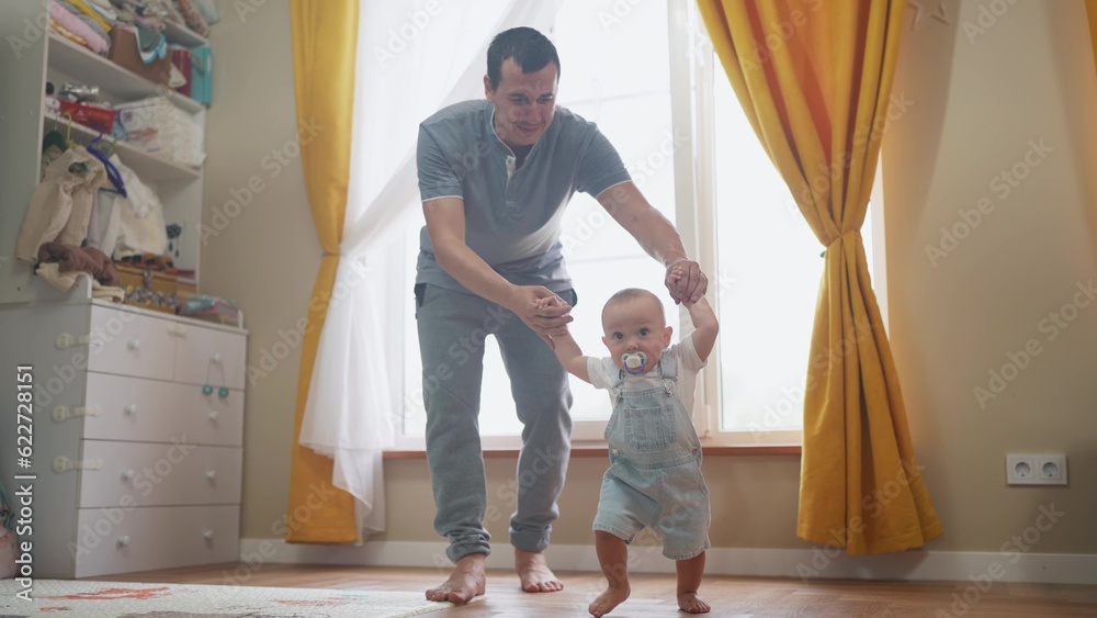 baby first steps. daddy a teaches baby toddler son to take first steps ...