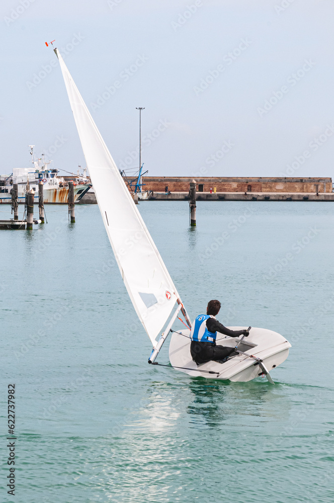 Poster Back view, medium distance of, a single, male, controlling ...