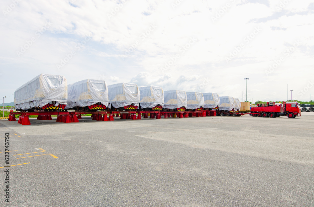 Transport of Oversize Heavy Machinery cargo truck Loading a new ...