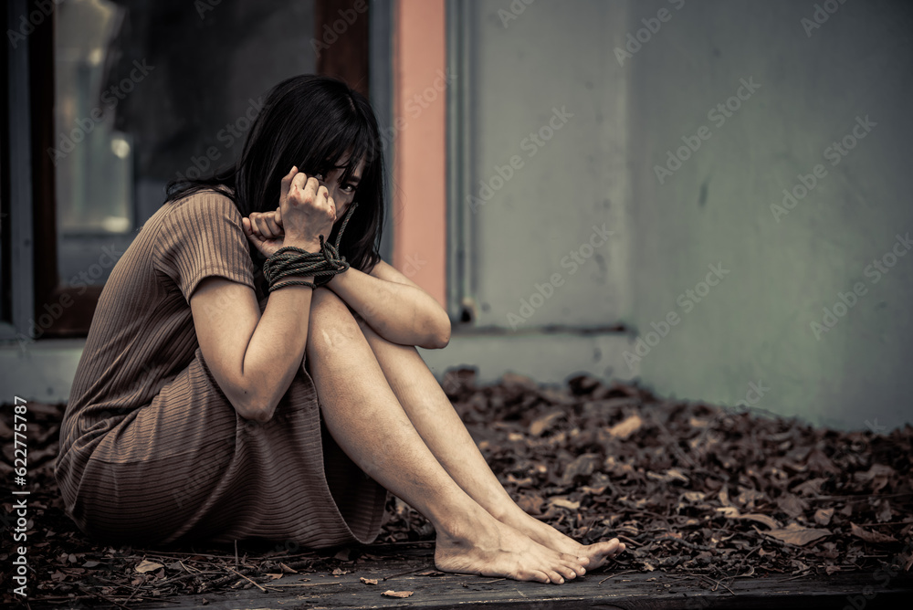 Asian hostage woman Bound with rope at night scene,The thieves kidnapped for ransom,thailand ...