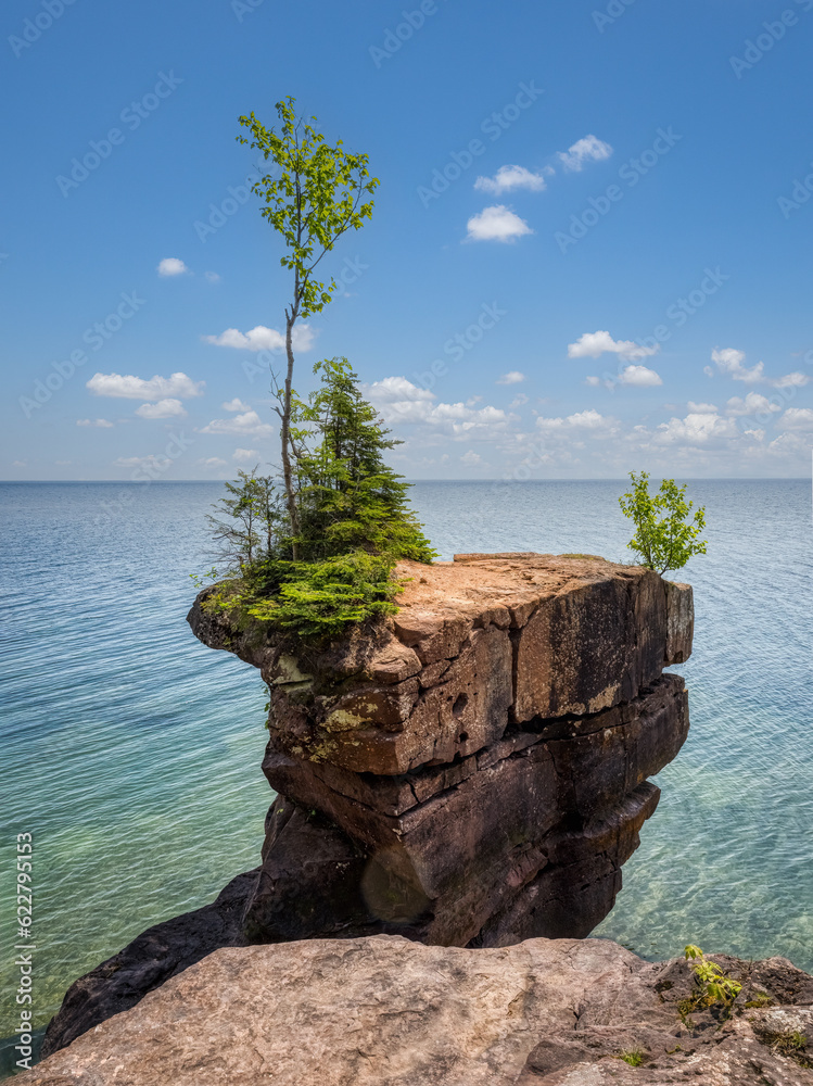 Rocky coastline of Lake Superior in Big Bay State Park in La Pointe on ...