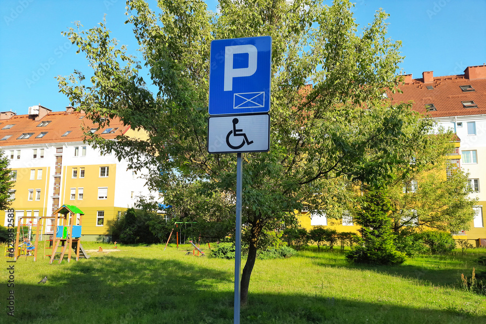 Road sign Parking only for disabled drivers on modern residential ...