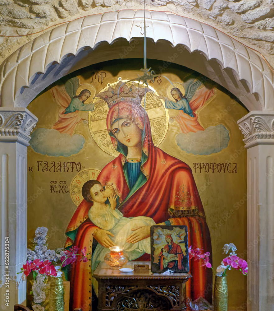 JERICHO, PALESTINE - JUNE 21,2023: The icon Virgin Mary suckling Jesus ...