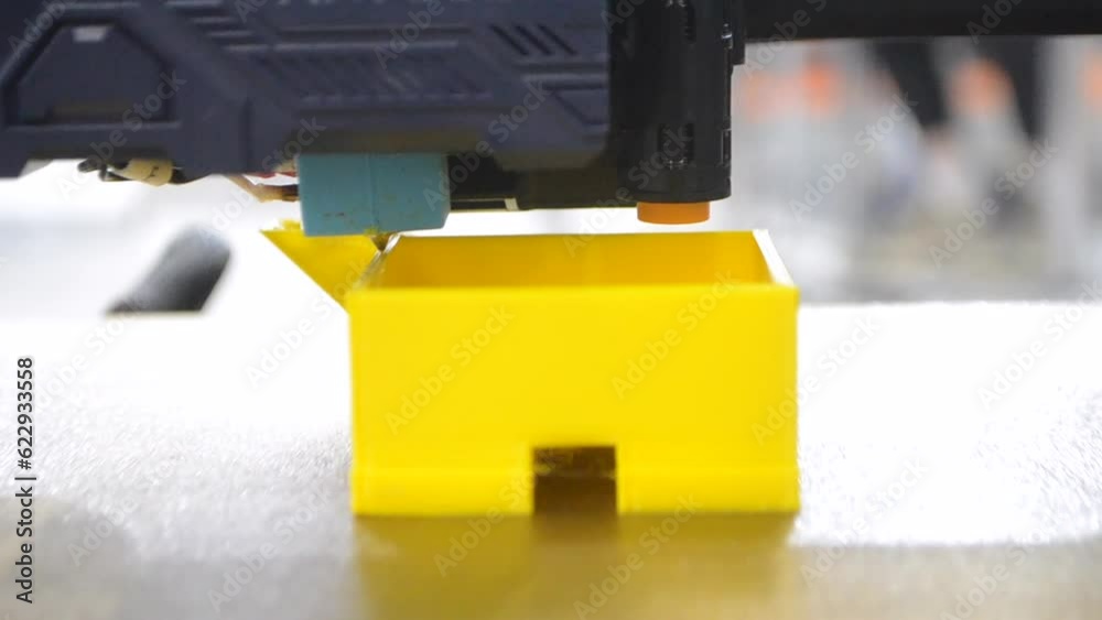 Abstract object printing on 3D printer with molten plastic close-up. 3D ...
