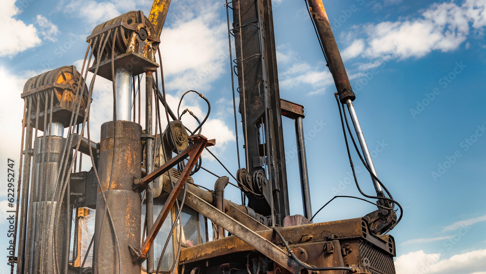 Pile driving machine. Diesel hammer pile driving machine working on ...