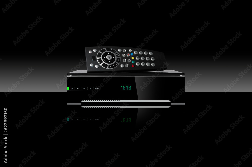 Tv decoder and remote control isolated on white background. Receiver ...