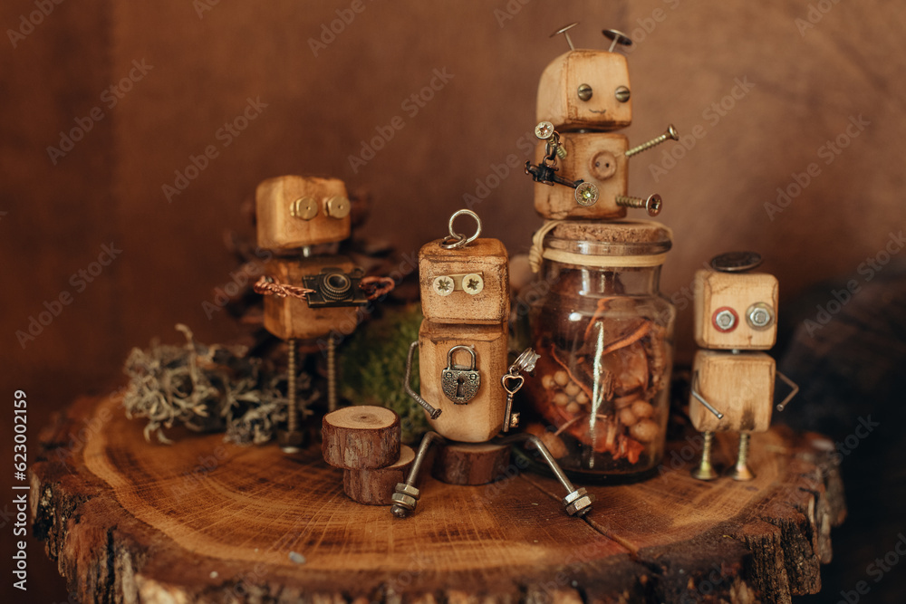 Cute family of robots made by hand from scrap materials, wooden robot ...