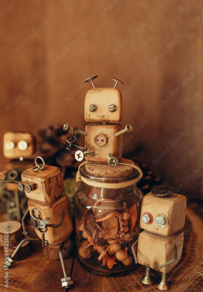 Cute family of robots made by hand from scrap materials, wooden robot ...