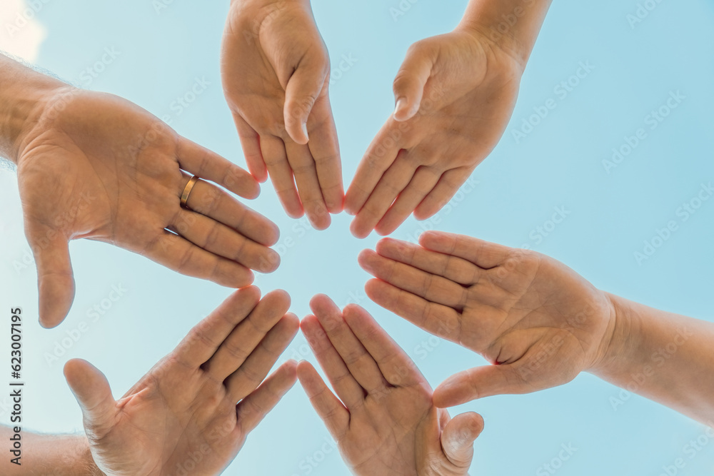 Joined hands as a team. Business teamwork. Close up group of friends ...