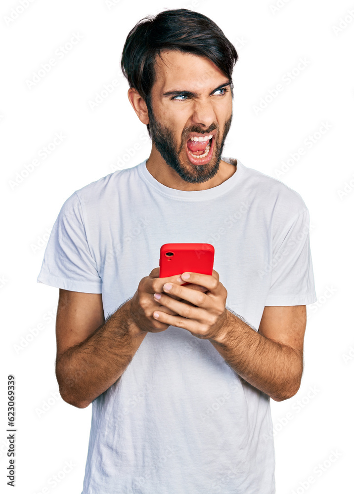 Foto De Hispanic Man With Blue Eyes Using Smartphone Typing Message