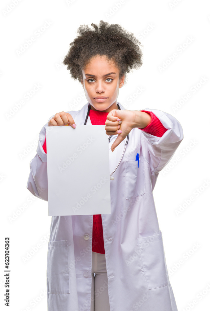 Young afro american doctor woman holding blank paper over isolated ...