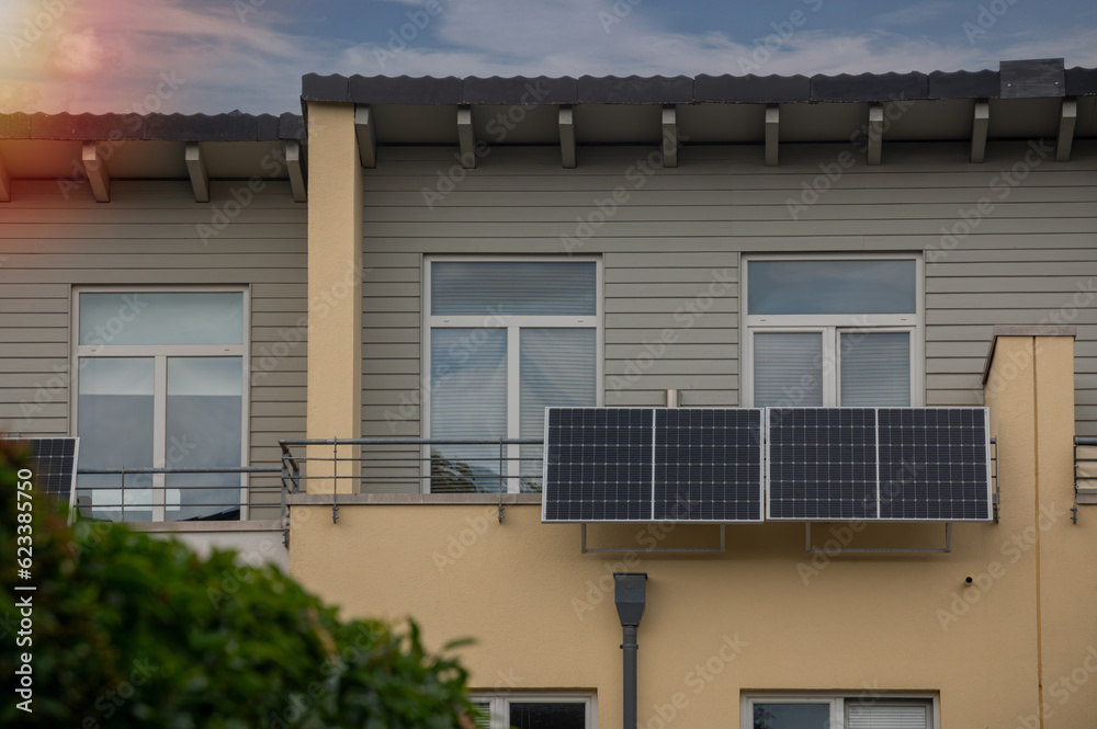 Solar power plant on a balcony with sunlight special lens flare light ...
