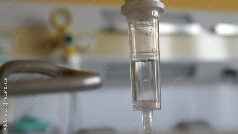Fluid Drug Dripping from Intravenous Therapy Drip-Bag in Hospital Room ...