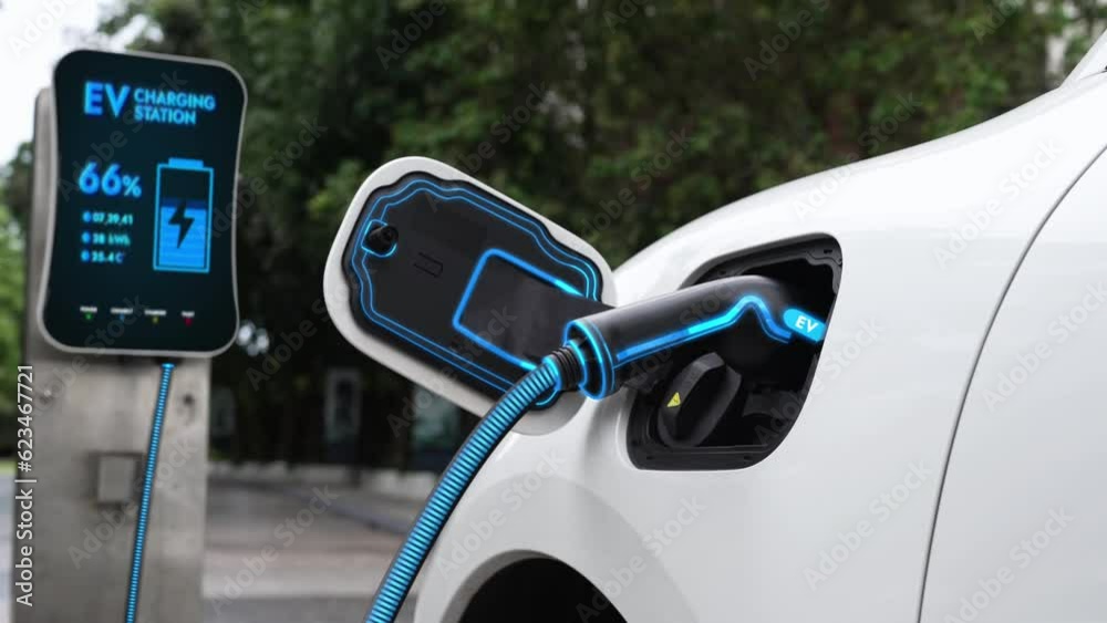 Electric car recharging battery by futuristic smart EV charger from eco ...