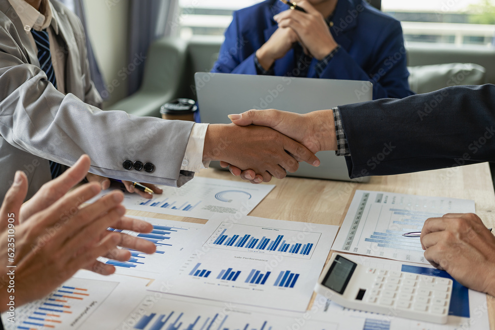 business people shaking hands The brainstorming meeting of the tax ...