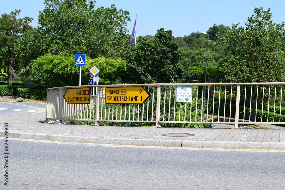 road sign in Schengen to several places Stock Photo | Adobe Stock