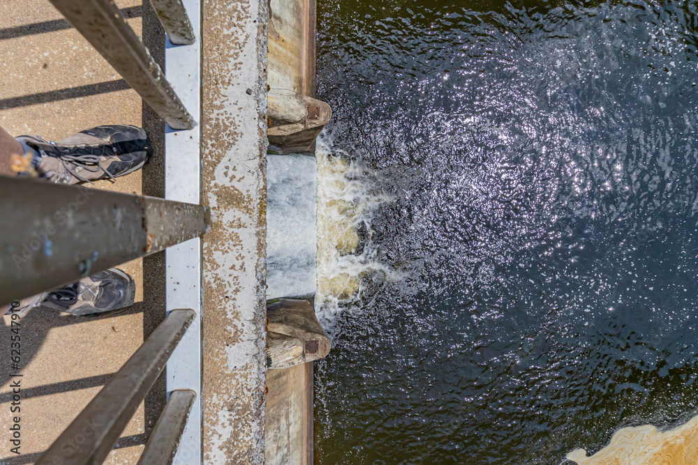 Two foot top perspective on Staumauer Bitburger dam bridge, water ...