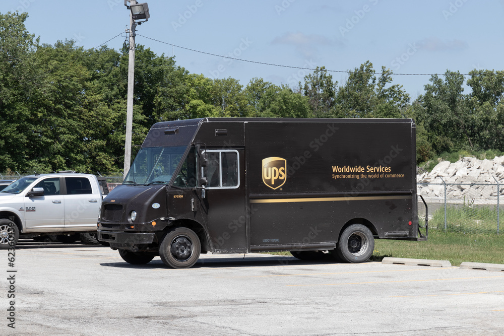 UPS delivery and transport trucks. UPS picks up, transports and ...
