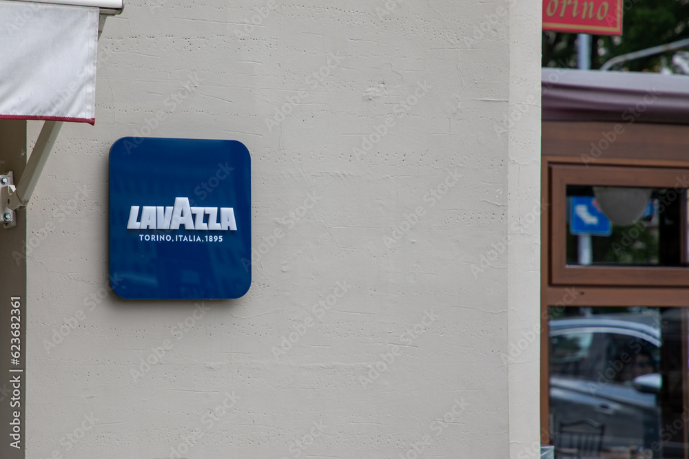 Lavazza torino logo brand and sign text on facade coffee wall bar ...