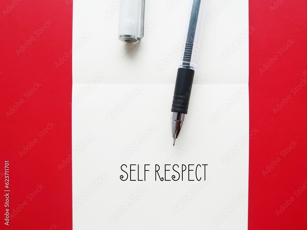 Notebook on red background with handwritten text SELF RESPECT - means ...