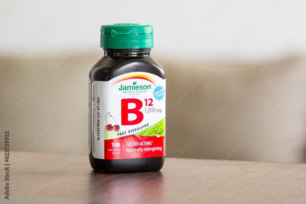 Bottle of Jamieson Vitamin B12 (cobalamin) supplement for better health ...