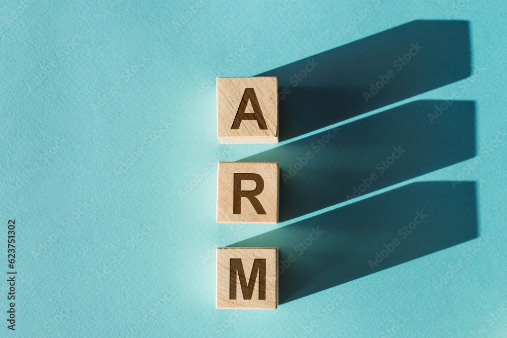 ARM - acronym from wooden blocks with letters, Advanced RISC Machine ...