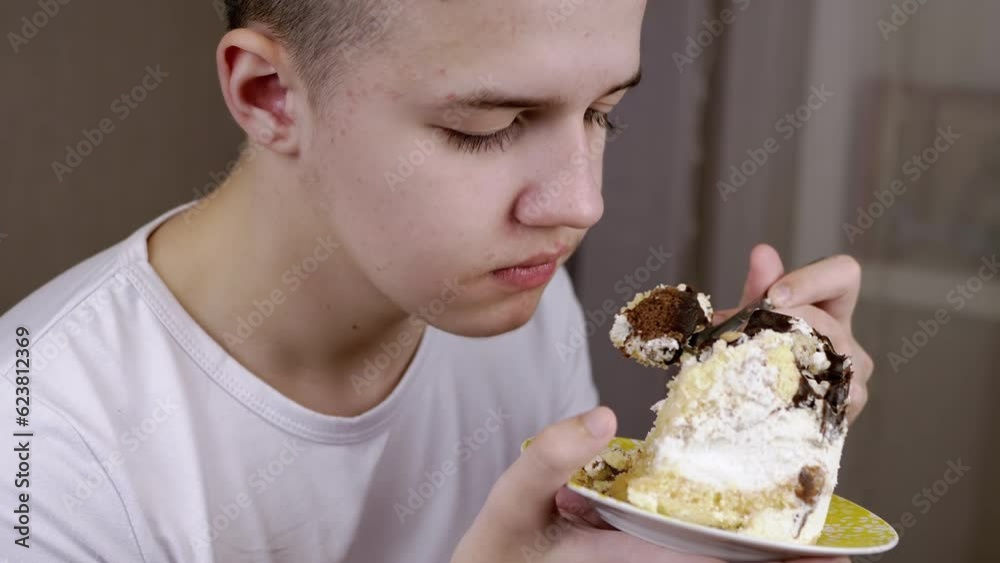 Close up, Face Child Eating a Large Piece of Cake with Cream or a ...