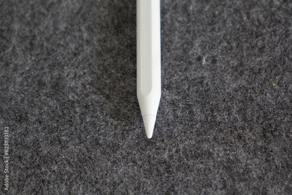 Poster White stylus on isolated grey background. Technology Concept ...