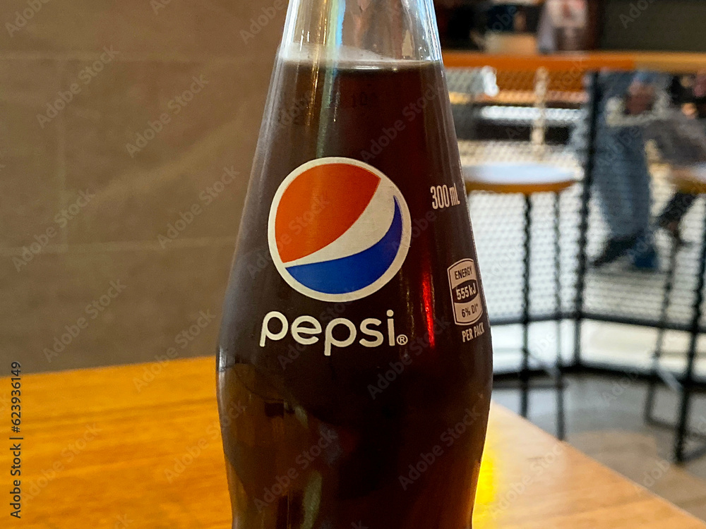 A bottle of Pepci Cola on the table at the foodcourt of Melbourne Airport, Australia Stock Photo ...