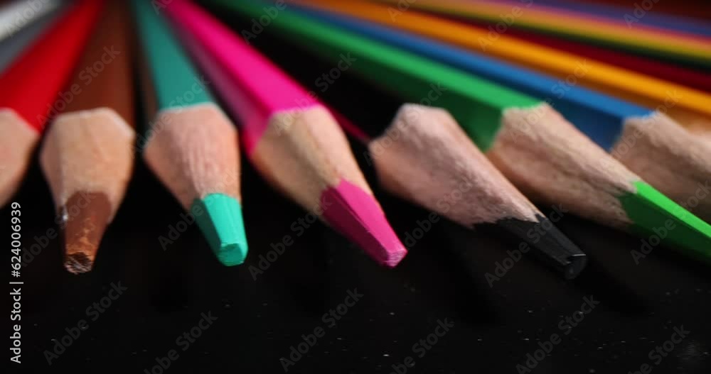 Assortment of colored pencils for drawing on black background. Colored ...