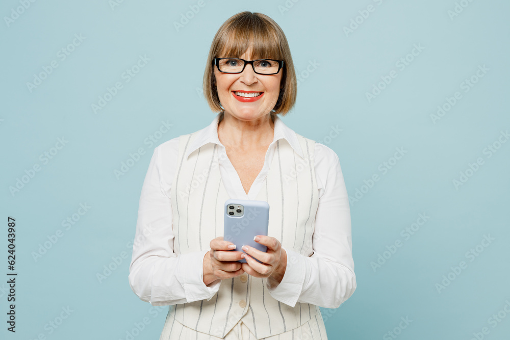Blonde successful employee business woman 50s wears white classic suit ...