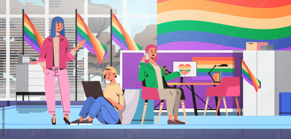 girls discussing during meeting and using laptop lgbt rainbow flag ...