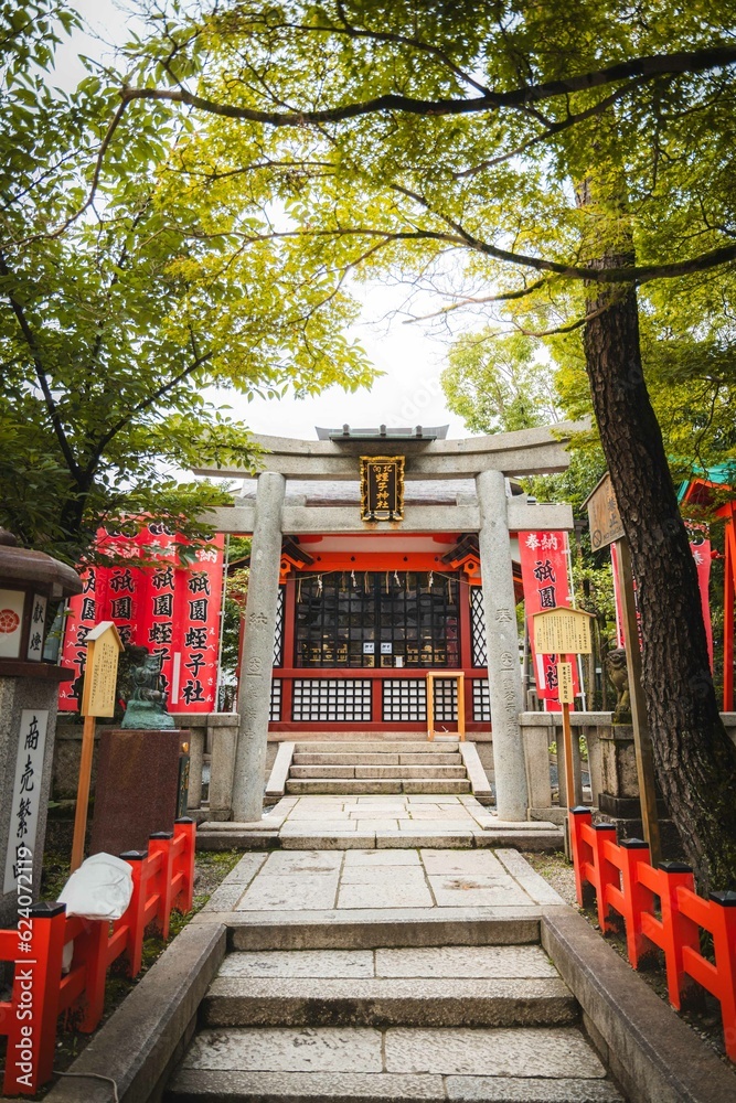 Japanese Torii gate in Kyoto. Traditional shrine gate near temples in a ...