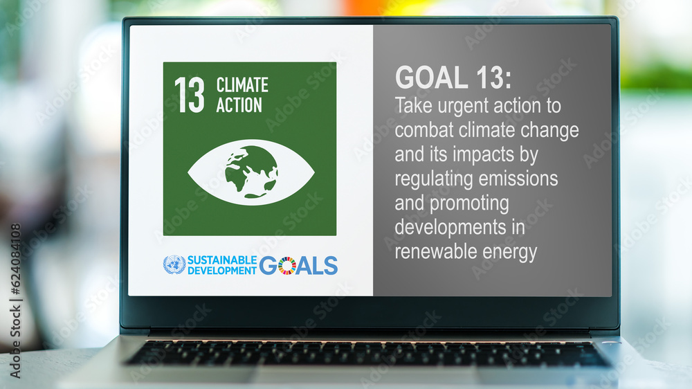 Laptop displaying logo of The Sustainable Development Goal 13 Stock ...