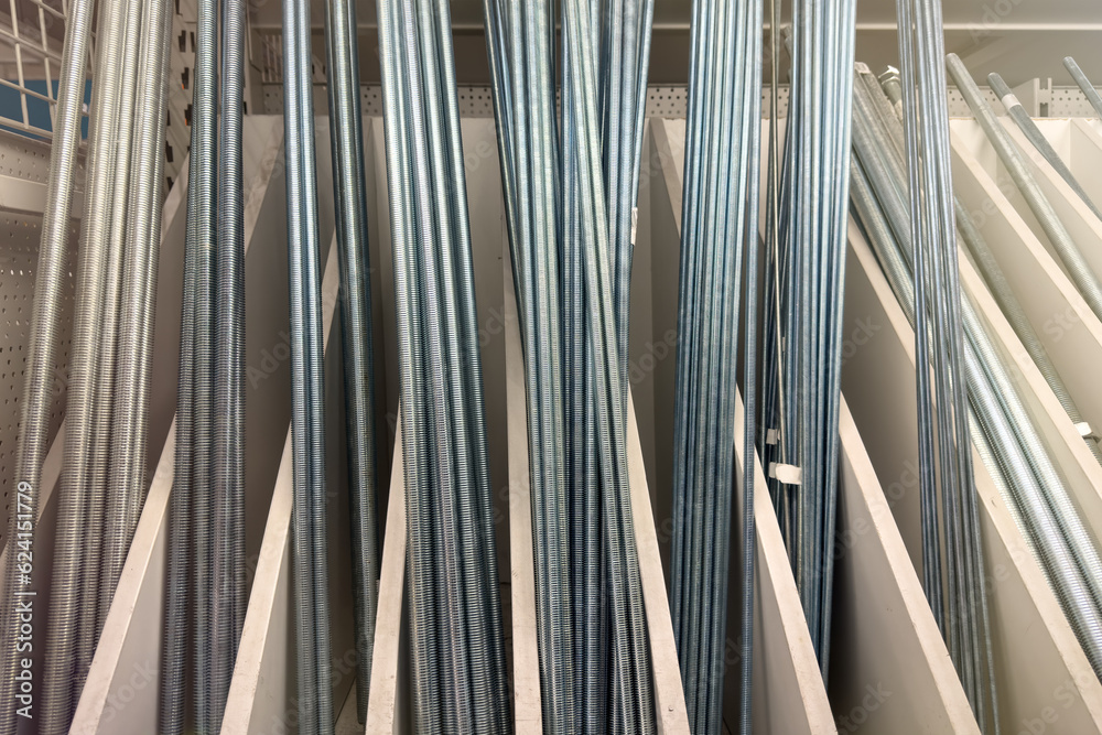 Threaded rods or threaded studs. Galvanized metal rod with threads ...