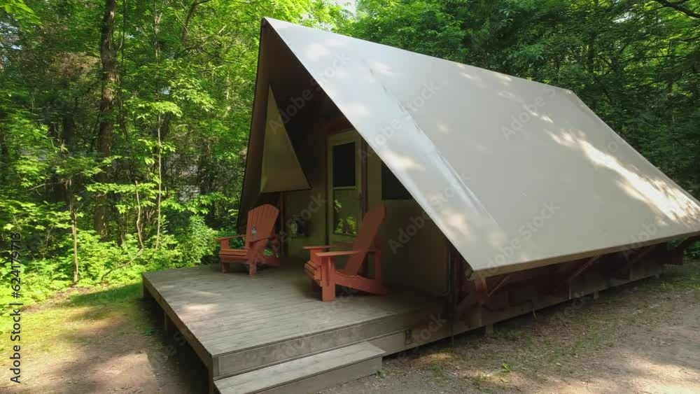 Point Pelee camping site with cabin tent under canopy of the Carolinian ...