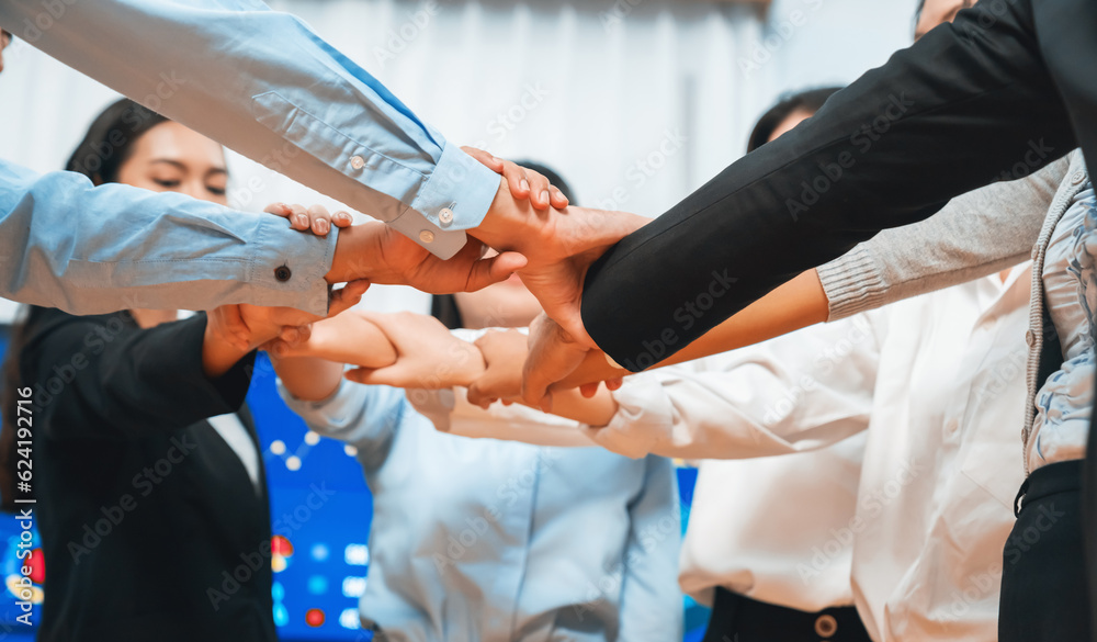 Multicultural business people holding hand together in circle. Unity ...