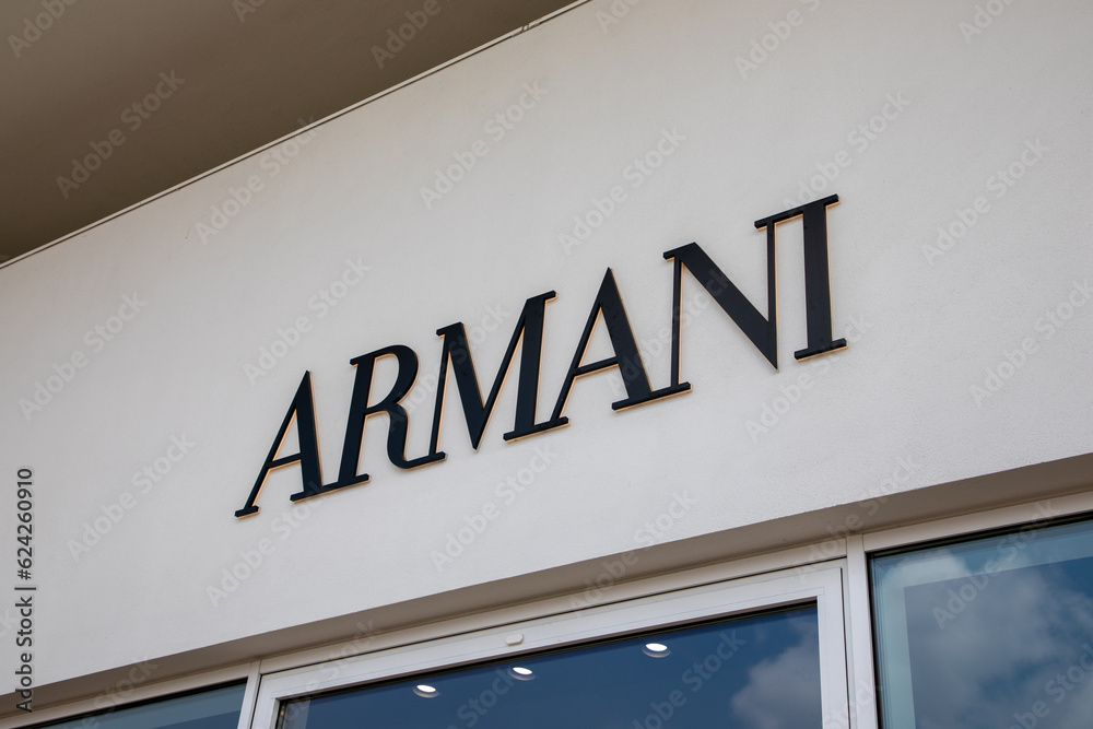 Armani facade shop wall facade sign brand and text logo of store ...
